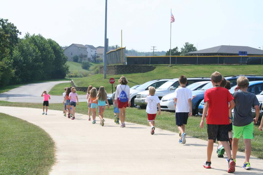 ASPIRE Students Walk, Listen, and Learn - The Walking Classroom